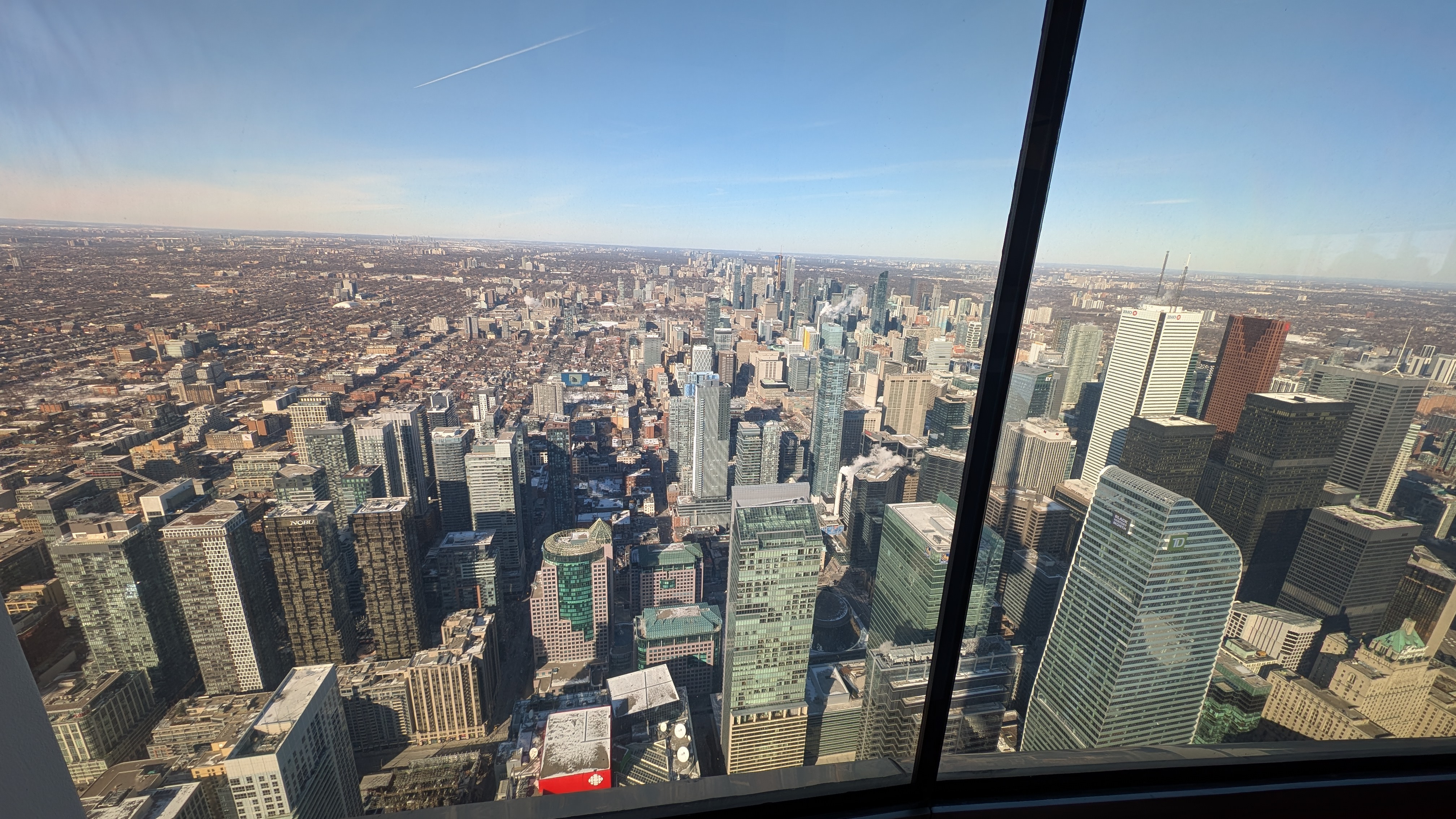 Frozen Beauty: Exploring the CN Tower on a Crisp Winter Day – Shells ...